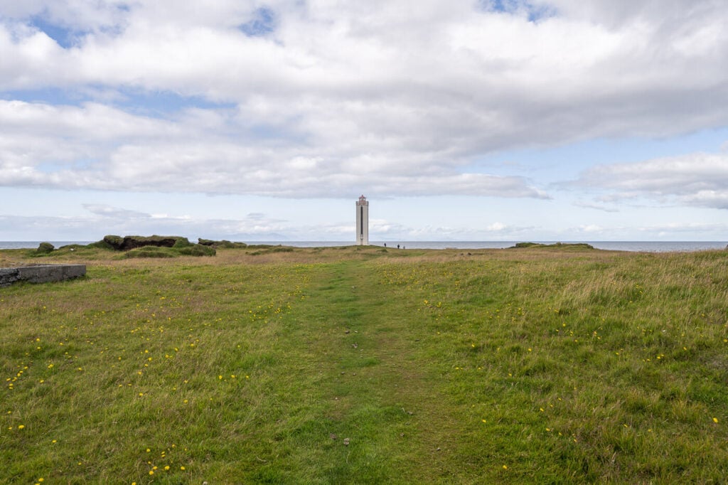 Kálfshamarsvík Lighthouse, a beautiful lighthouse surrounded by basalt ...
